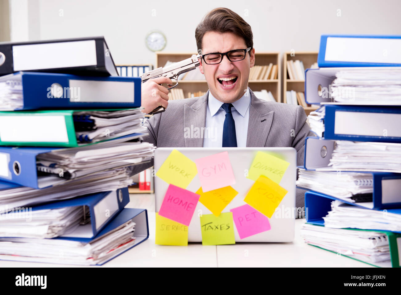 Businessman struggling with multiple priorities Stock Photo - Alamy