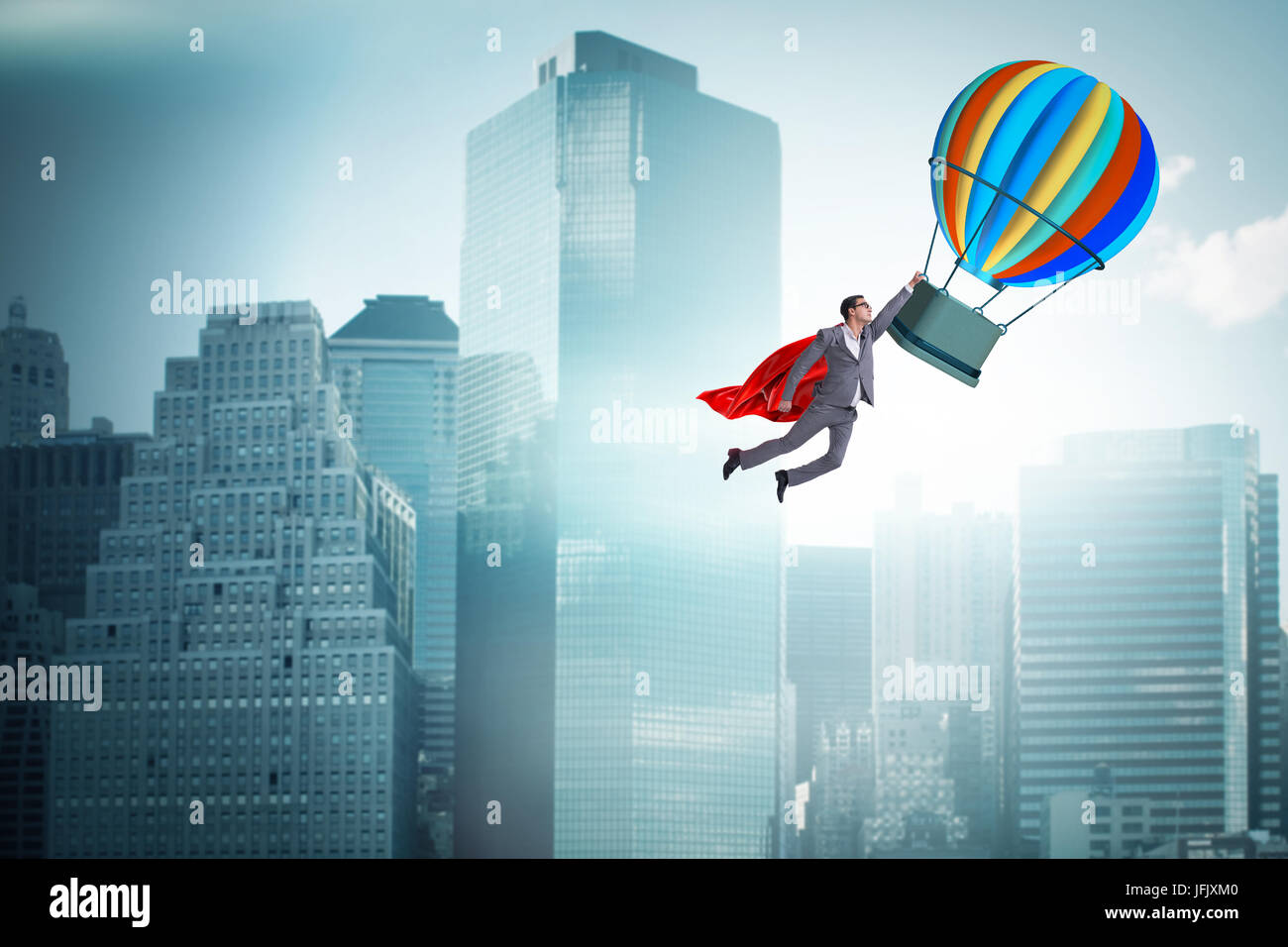 Businessman flying on balloon in challenge concept Stock Photo - Alamy