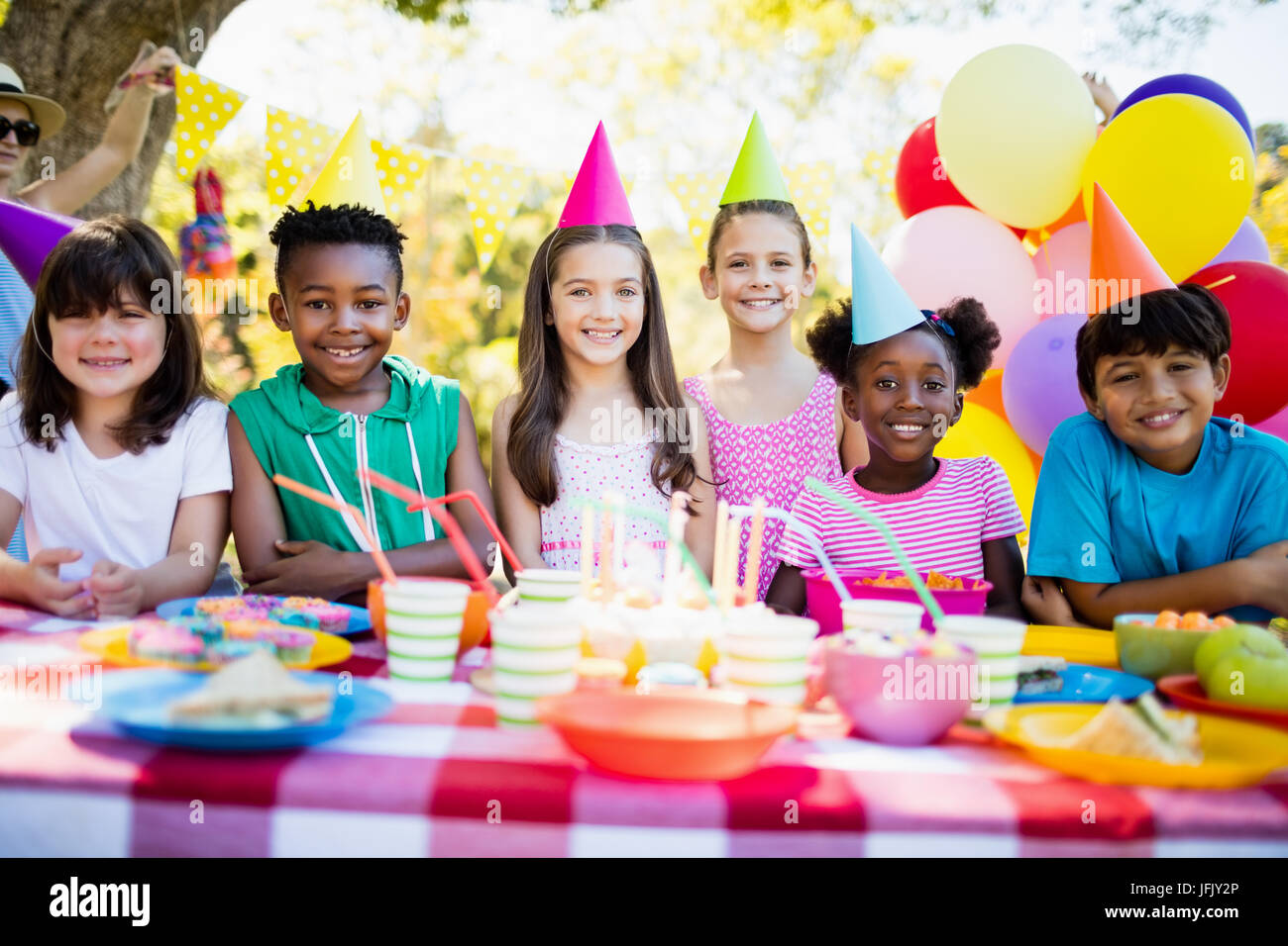 Group of children smiling and posing during a birthday party Stock ...
