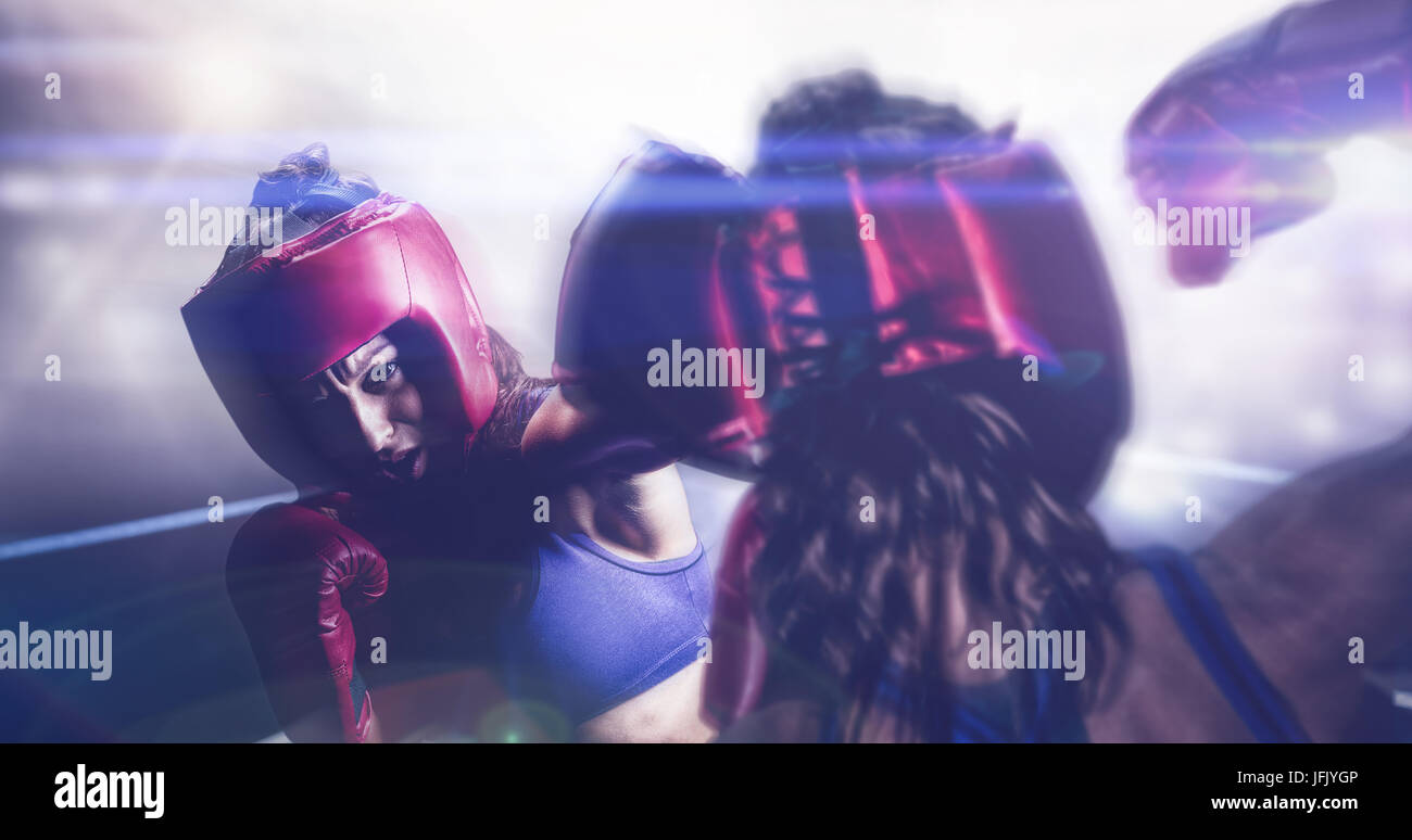 Female fighter flexing muscles hi-res stock photography and images - Alamy