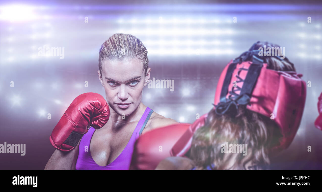 Female fighter flexing muscles hi-res stock photography and images - Alamy