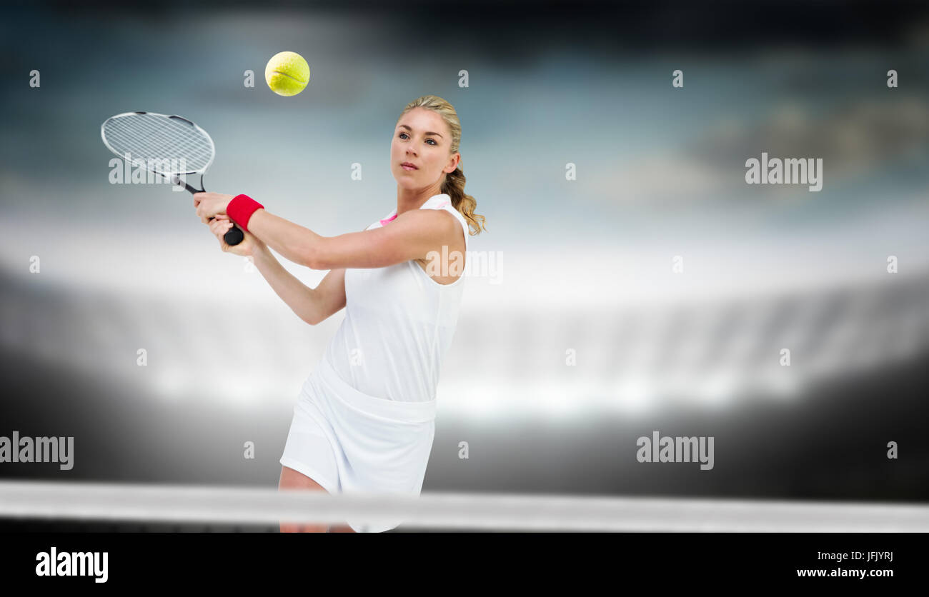 Composite image of athlete playing tennis with a racket Stock Photo - Alamy
