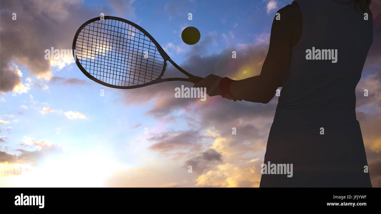 Composite image of athlete playing tennis with a racket Stock Photo - Alamy