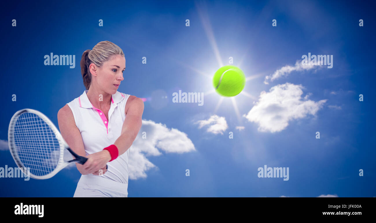 Composite image of athlete playing tennis with a racket Stock Photo - Alamy