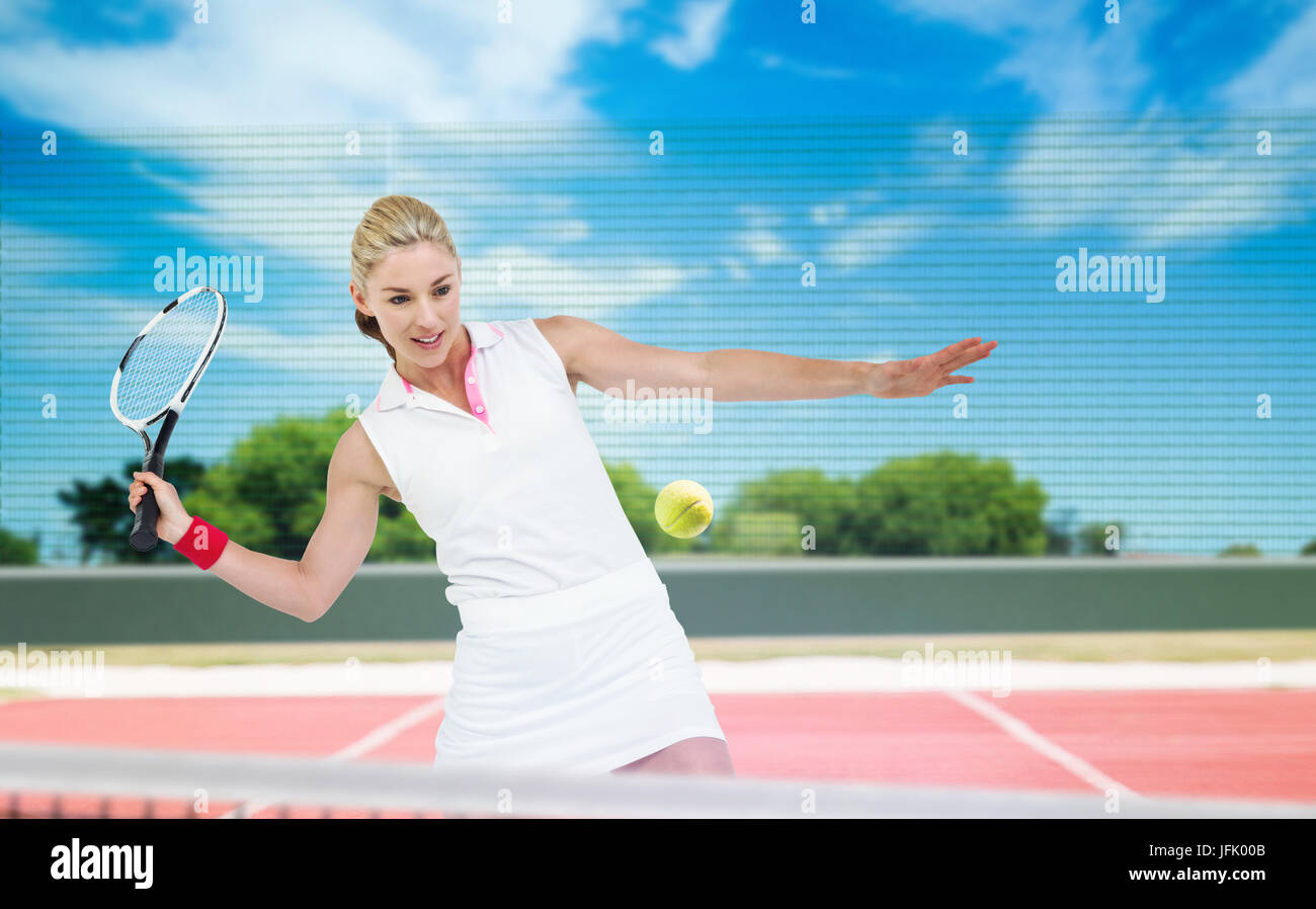 Composite image of athlete playing tennis with a racket Stock Photo - Alamy