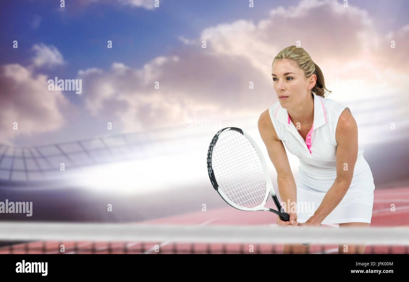 Composite image of athlete playing tennis with a racket Stock Photo - Alamy
