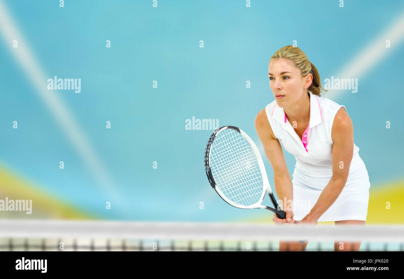 Composite image of athlete playing tennis with a racket Stock Photo - Alamy