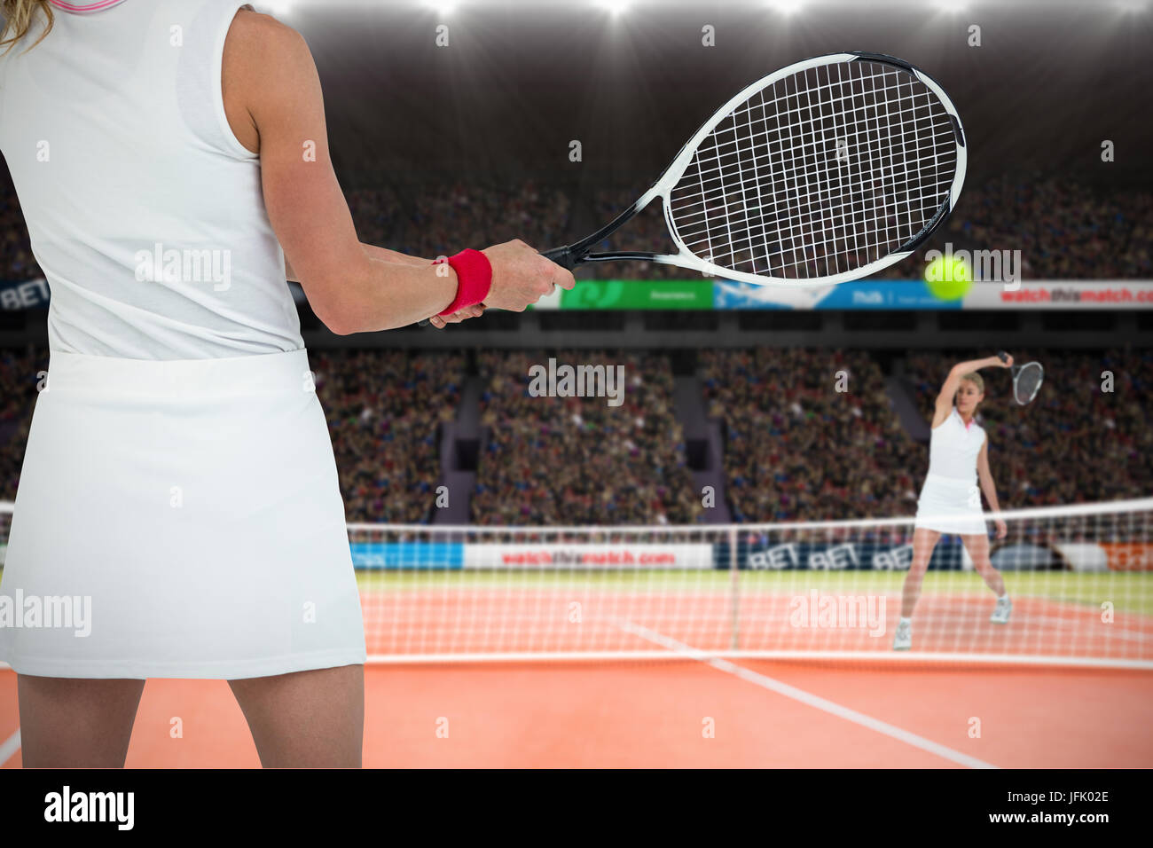 Composite image of athlete playing tennis with a racket Stock Photo - Alamy