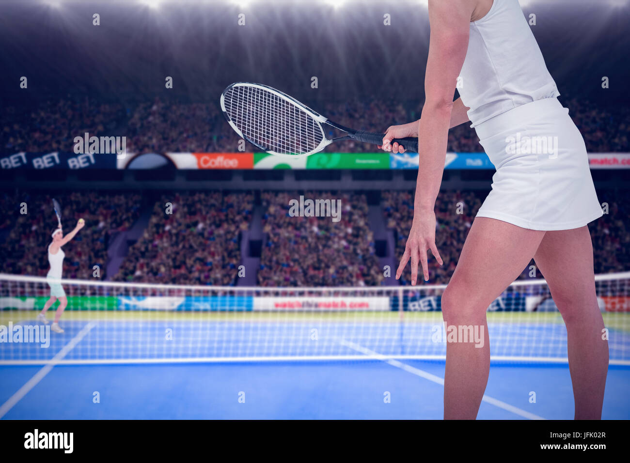 Composite image of athlete playing tennis with a racket Stock Photo - Alamy