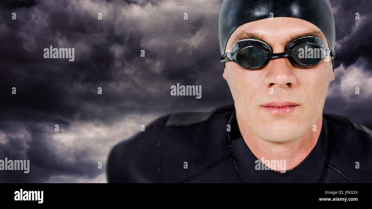 Composite image of close-up of confident swimmer in wetsuit Stock Photo ...