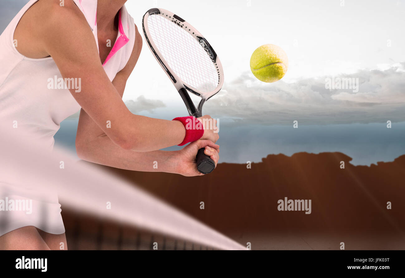 Composite image of athlete playing tennis with a racket Stock Photo - Alamy