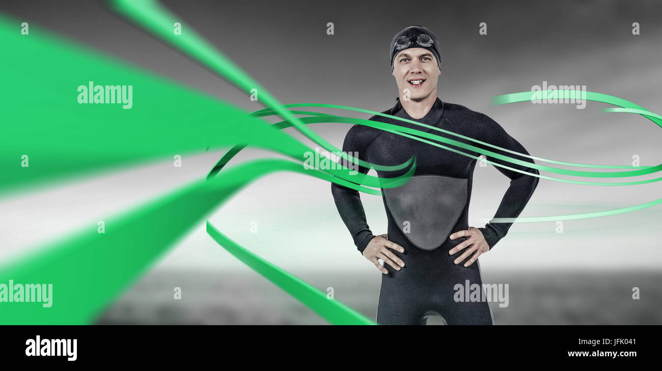 Composite image of portrait of confident swimmer in wetsuit Stock Photo ...