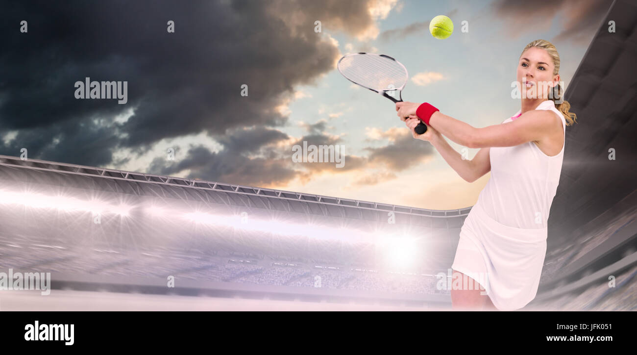 Composite image of athlete playing tennis with a racket Stock Photo - Alamy
