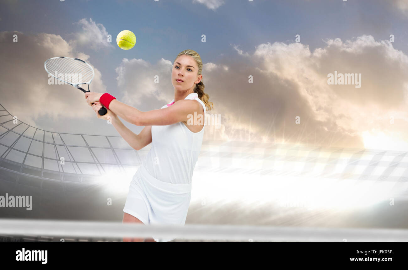Composite image of athlete playing tennis with a racket Stock Photo - Alamy