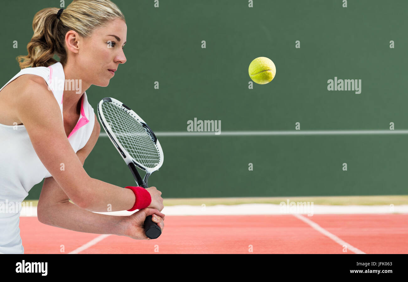 Composite image of athlete playing tennis with a racket Stock Photo - Alamy