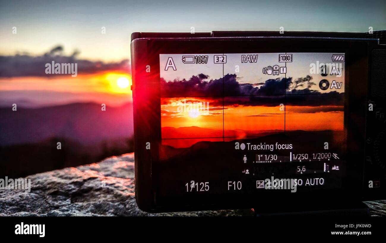 Camera click sunset hi-res stock photography and images - Alamy