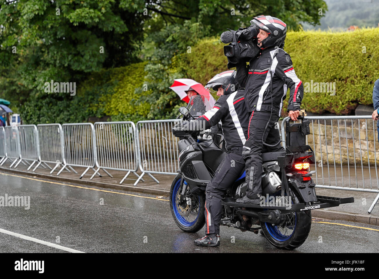 Motorcycle cameramen filming Otley Cycle race Stock Photo - Alamy