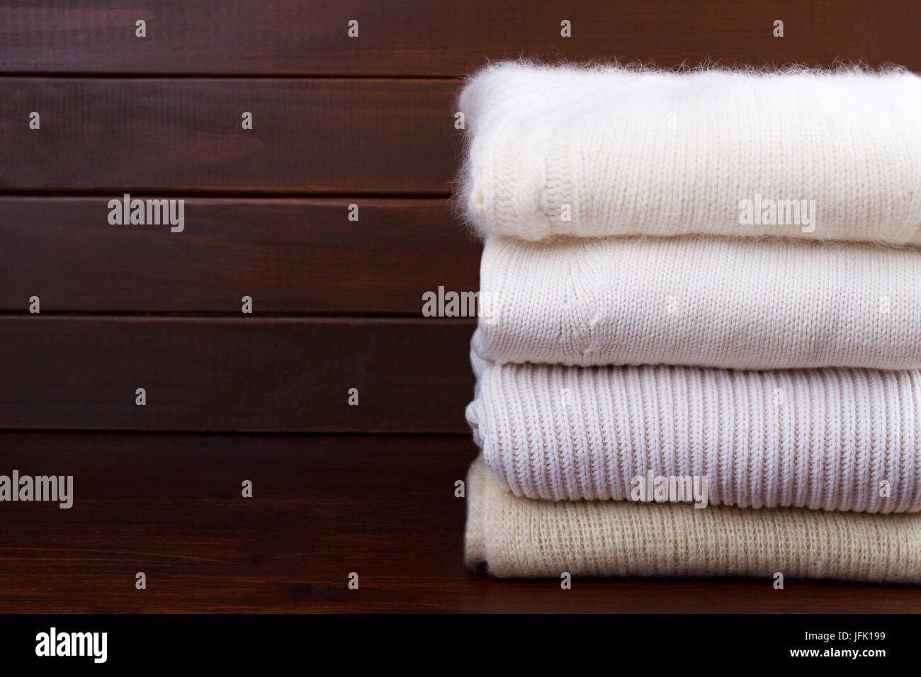 Stack of knitted sweaters Stock Photo - Alamy