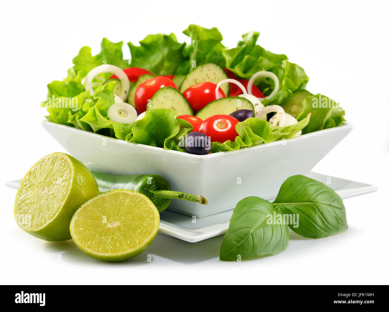Vegetable salad bowl isolated on white background Stock Photo - Alamy