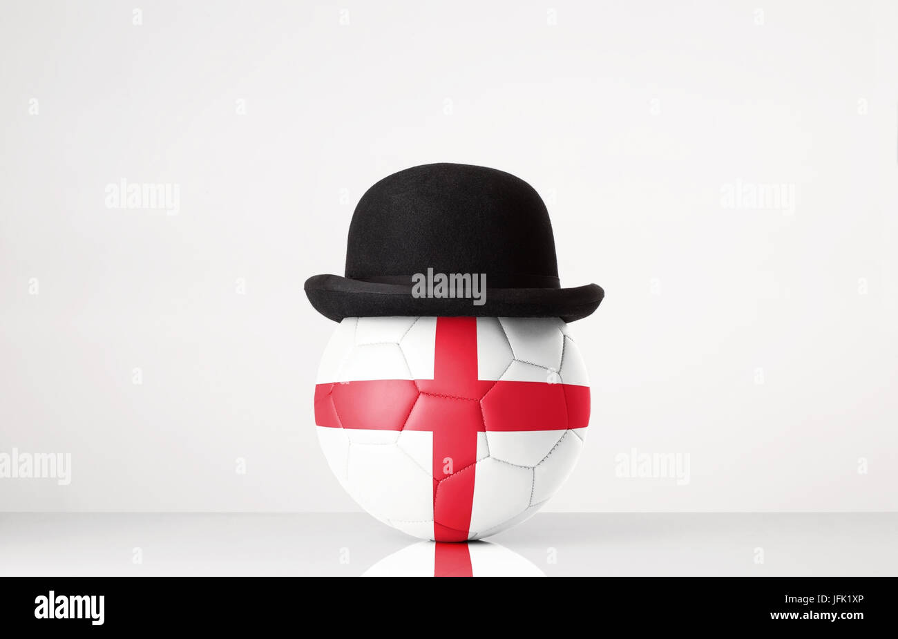 still life image of football wearing a bowler hat with England flag ...