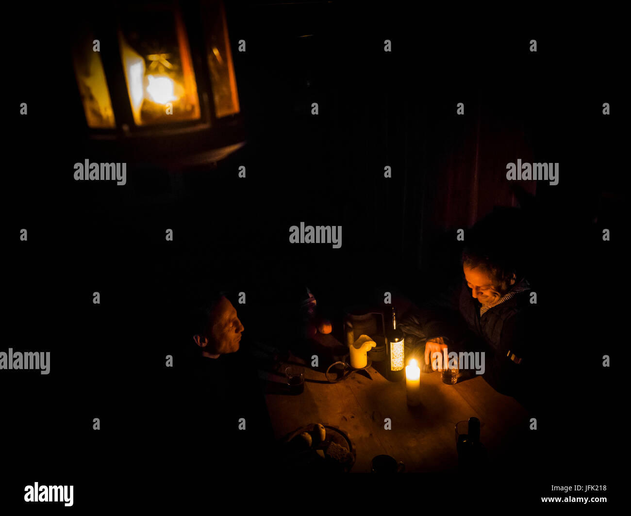 Elevated view of men in dark room Stock Photo - Alamy