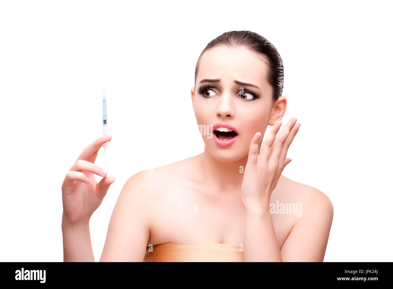 Woman scared of plastic surgery isolated on white Stock Photo - Alamy