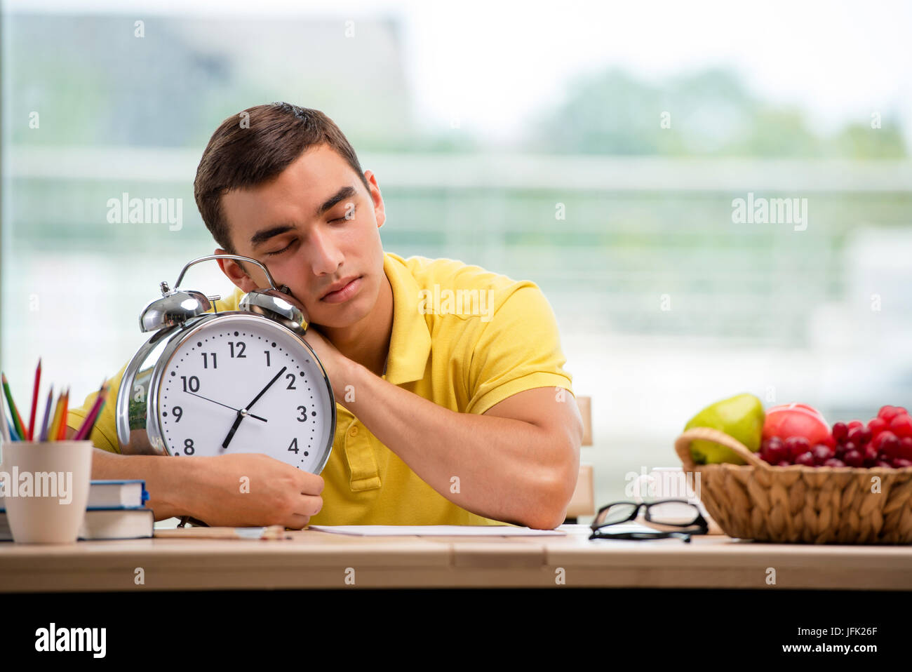 Student missing deadlines for exam preparation Stock Photo - Alamy