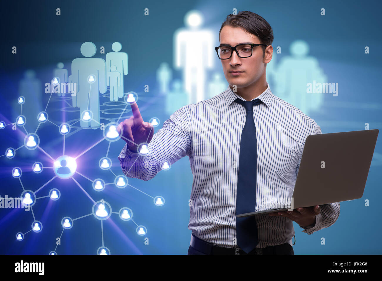 Businessman with laptop in social network concept Stock Photo - Alamy