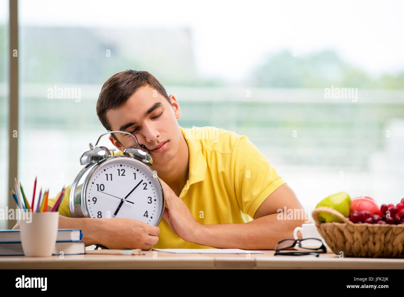 Student missing deadlines for exam preparation Stock Photo - Alamy