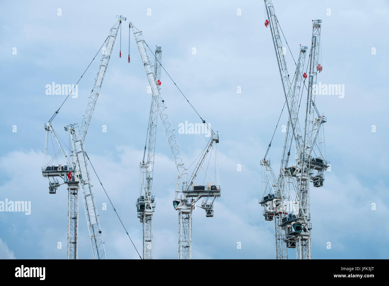 Many tall cranes above building site Stock Photo - Alamy