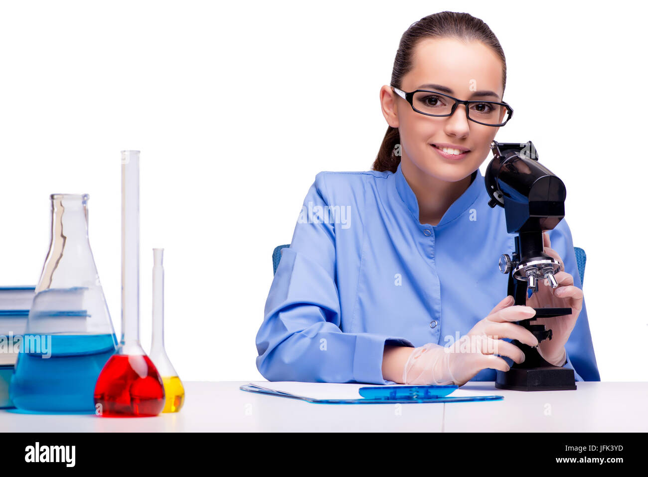 Lab chemist working with microscope and tubes Stock Photo - Alamy