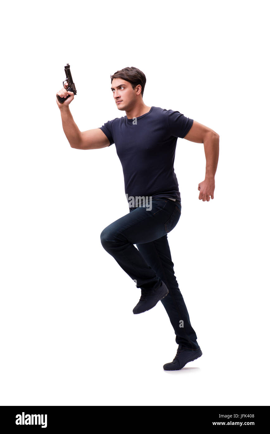 Aggressive young man with gun isolated on white Stock Photo - Alamy