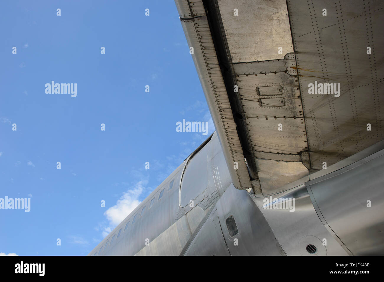 Wing texture of old commercial airplane Stock Photo - Alamy