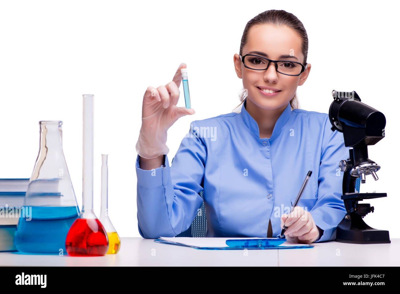Lab chemist working with microscope and tubes Stock Photo - Alamy