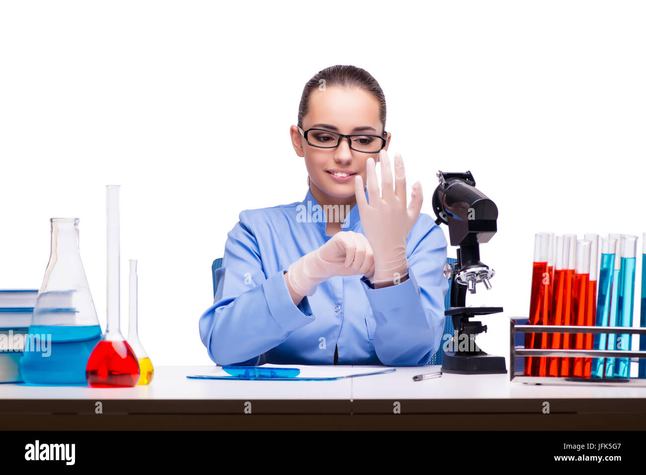 Lab chemist working with microscope and tubes Stock Photo - Alamy