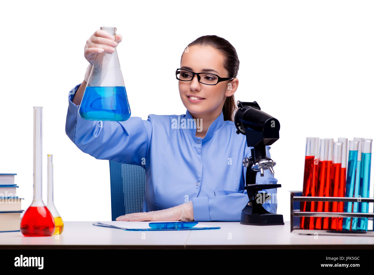 Lab chemist working with microscope and tubes Stock Photo - Alamy