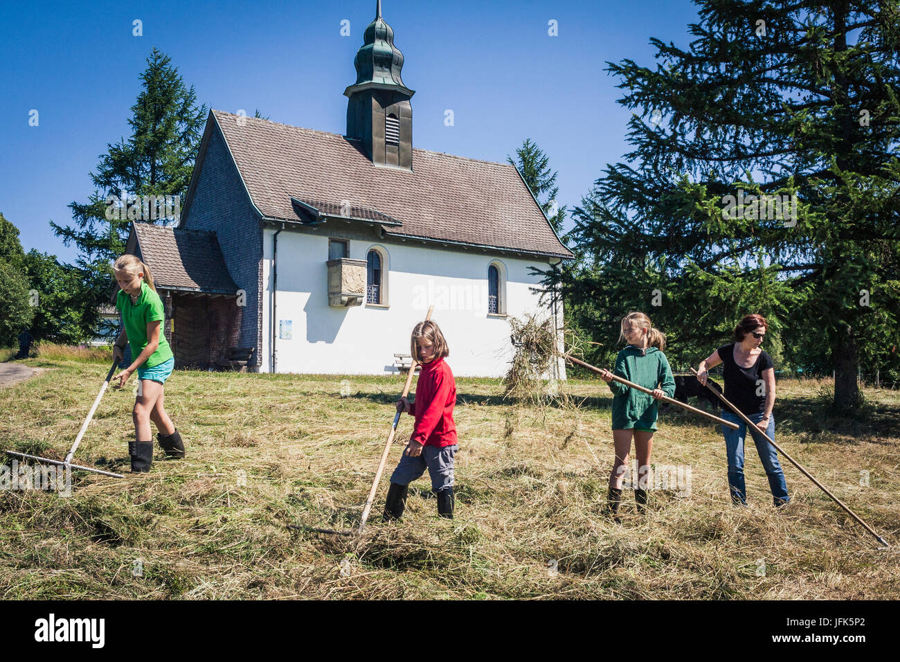 Farmer girl hay hi-res stock photography and images - Alamy