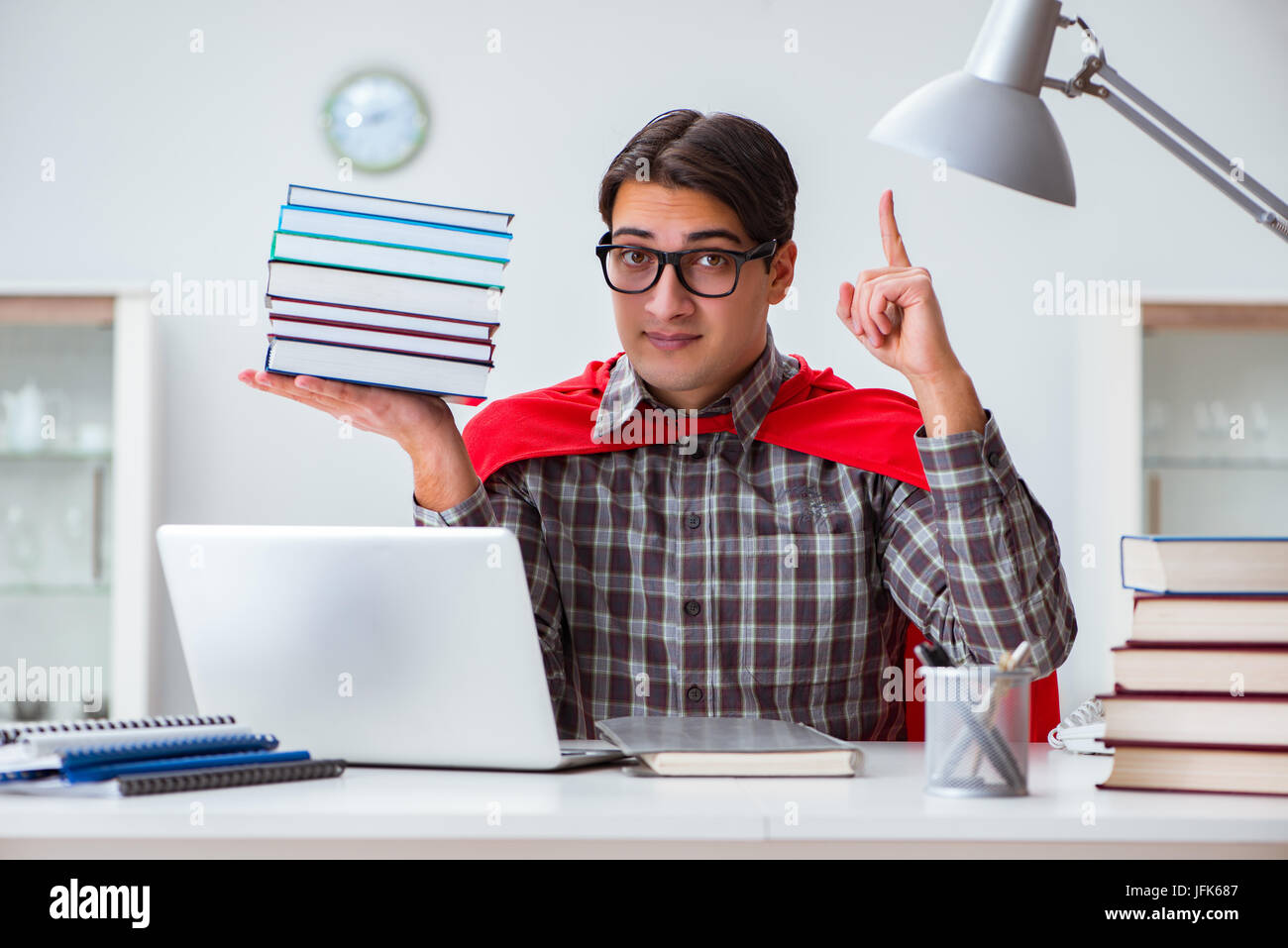 Reading super hero comic hi-res stock photography and images - Alamy