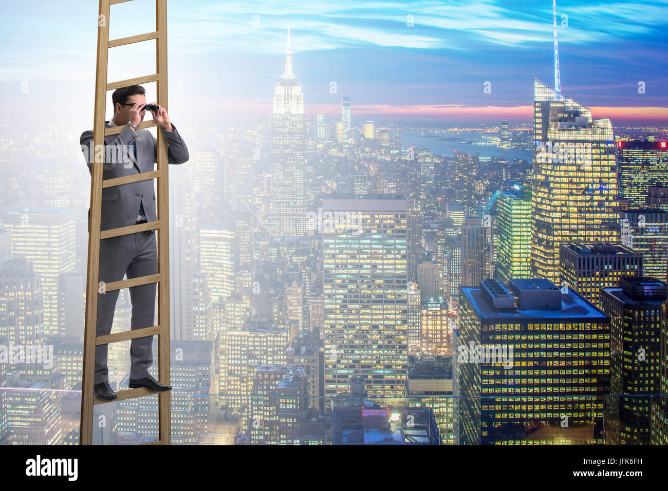 Businessman with binoculars looking into future Stock Photo - Alamy