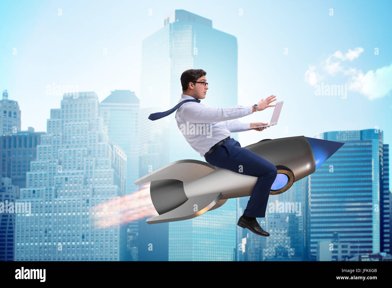 Businessman flying on rocket in business concept Stock Photo - Alamy