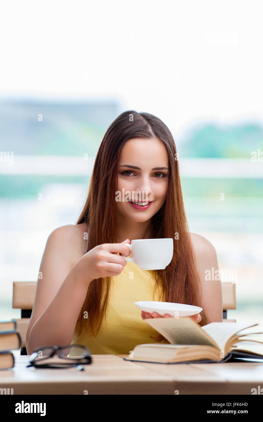 Teen reading drinking tea hi-res stock photography and images - Alamy
