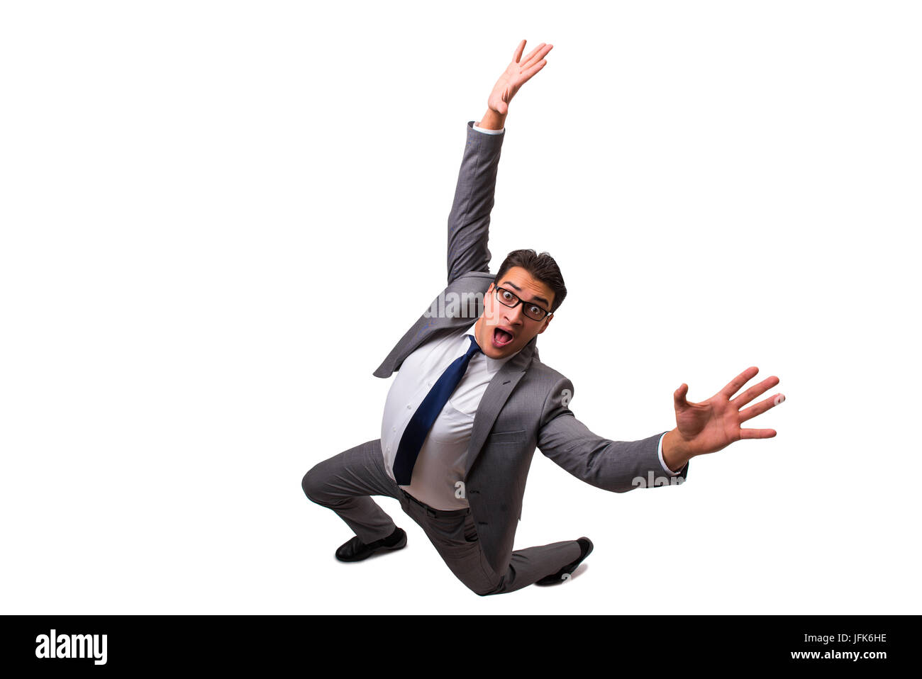 Falling businessman isolated on the white background Stock Photo - Alamy