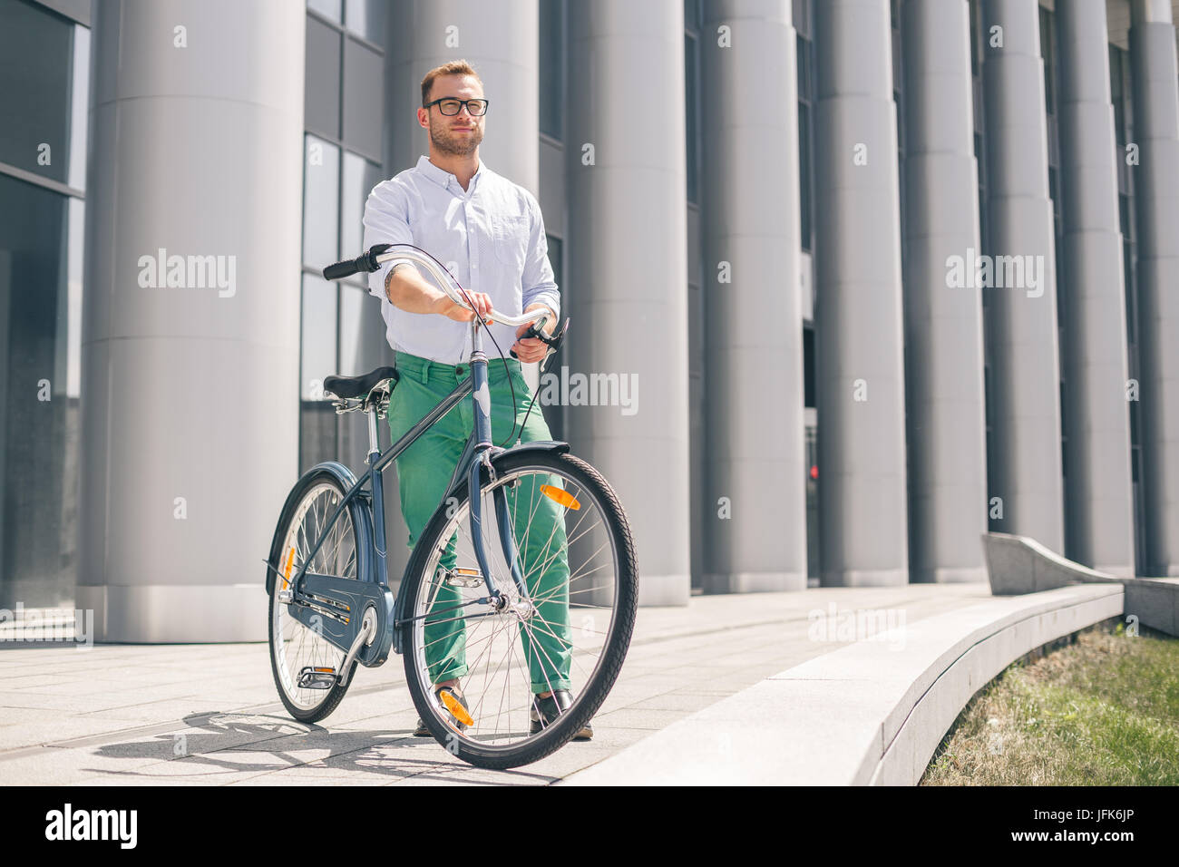 Bearded businessman riding bicycle work hi-res stock photography and ...