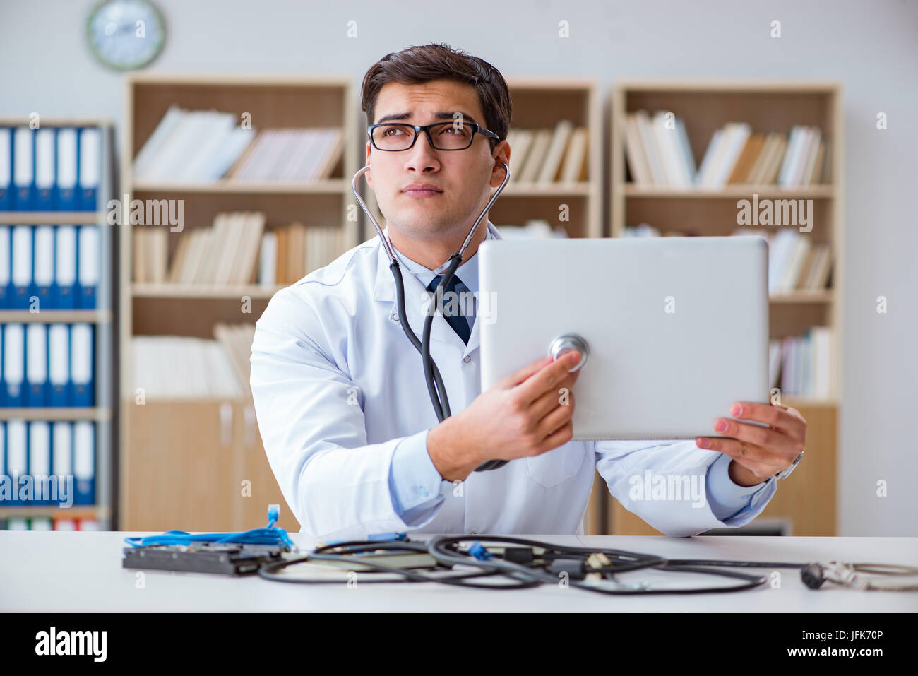 IT technician repairing broken laptop notebook computer Stock Photo - Alamy