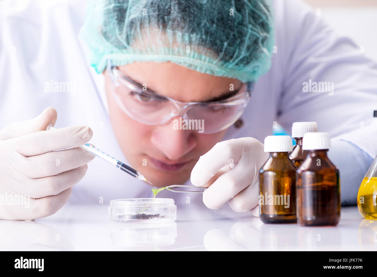 Pharmaceutical industry concept with scientist in the lab Stock Photo ...