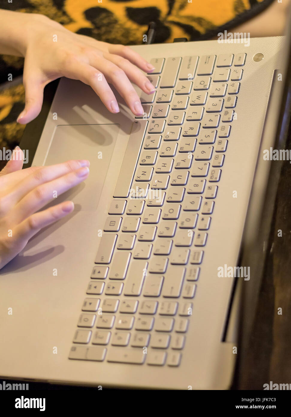 hands on laptop keyboard Stock Photo - Alamy