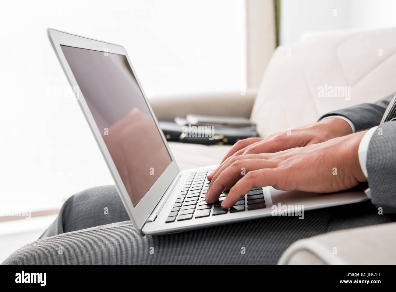 Businessman working with laptop in business concept Stock Photo - Alamy
