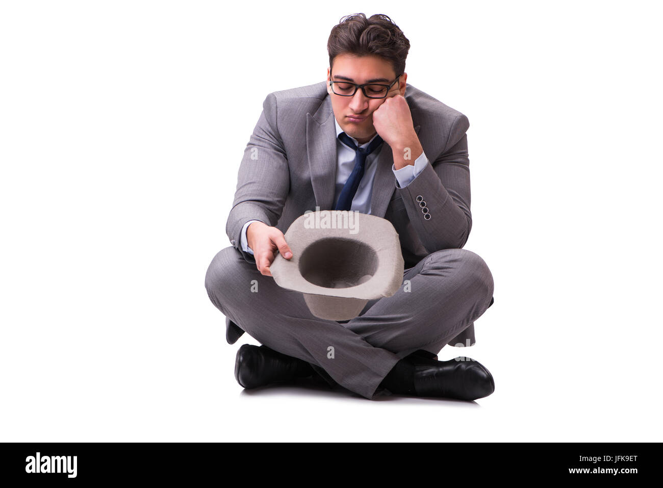 Bankrupt businessman isolated on white background Stock Photo - Alamy