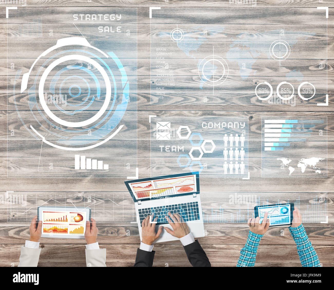 Group of three people with devices in hands working together as symbol ...