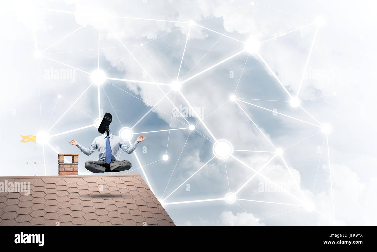 Faceless businessman with camera zoom instead of head sitting in lotus ...